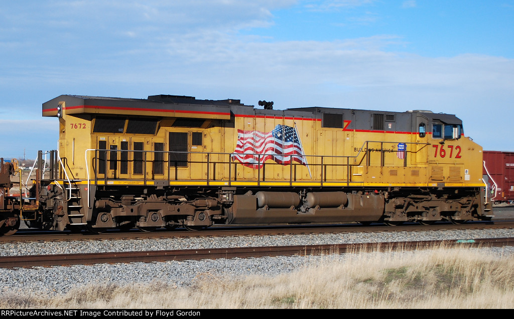 UP 7672 is DPU on autorack, intermodal train